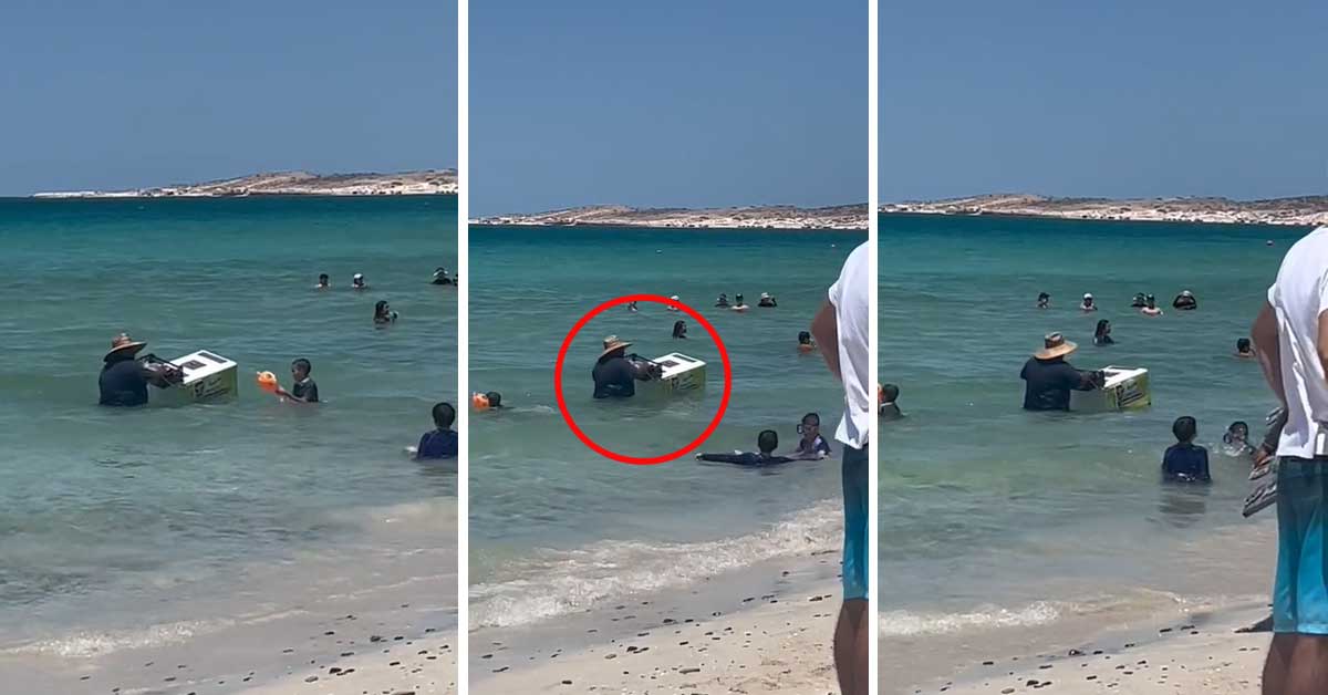 ¡Increíble! Heladero lucha contra las olas para vender sus productos ...